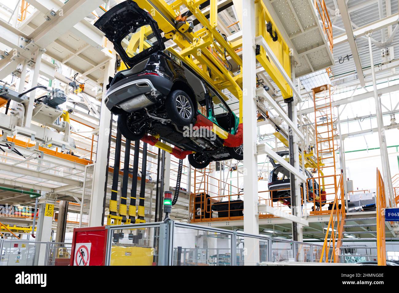 Photo of automobile production line. Welding car body. Modern car ...