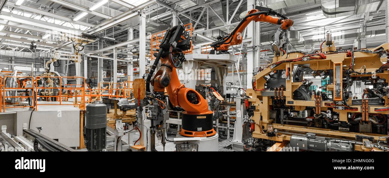 Photo of automobile production line. Welding car body. Modern car ...