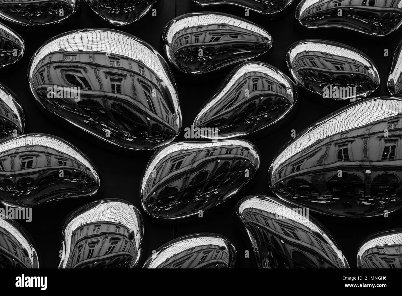 Building reflecting in metallic drops Stock Photo - Alamy