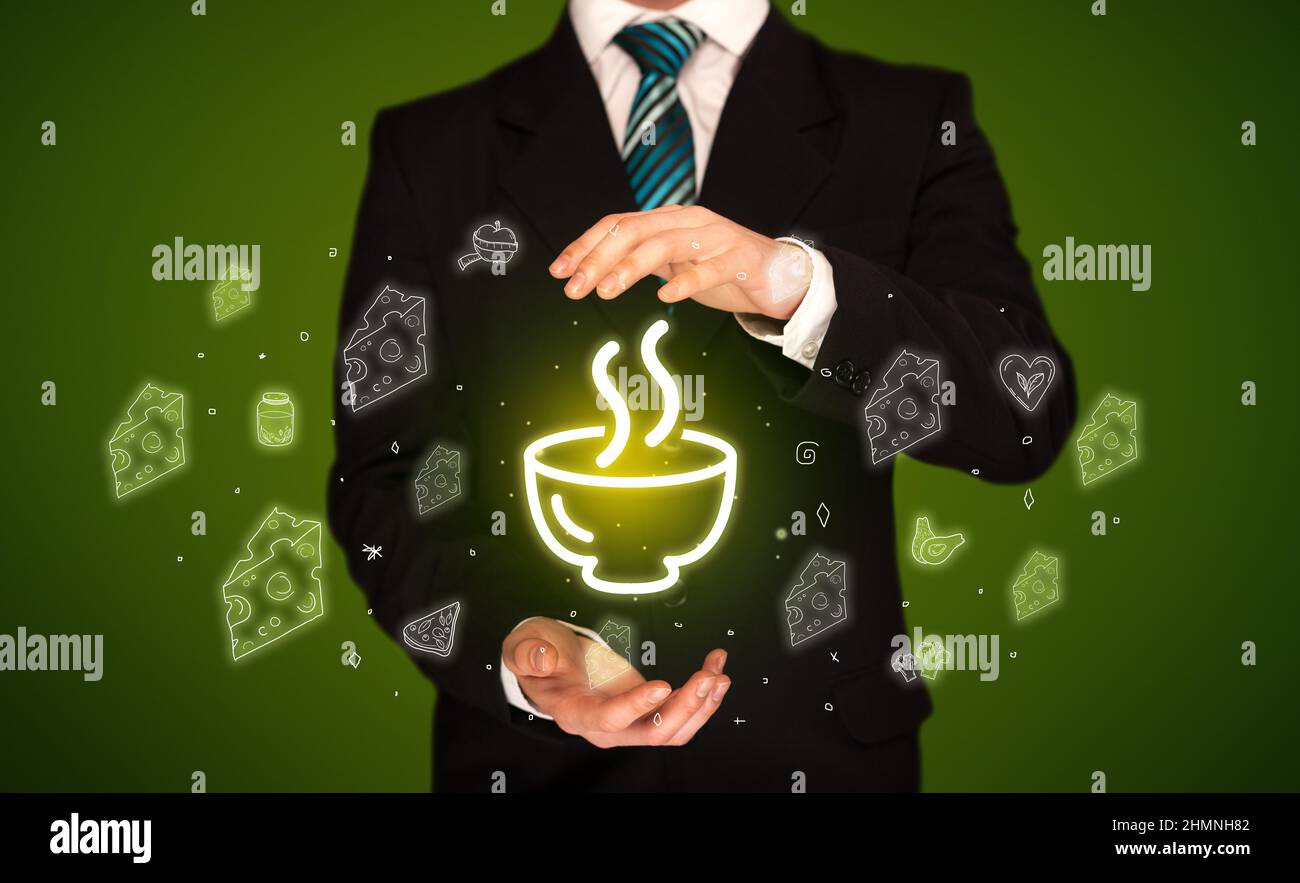 Hand holding food related icons Stock Photo - Alamy