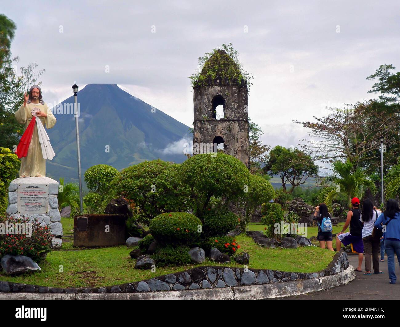 Historic old bell tower in front of the mount Mayon at the Cagsawa ...