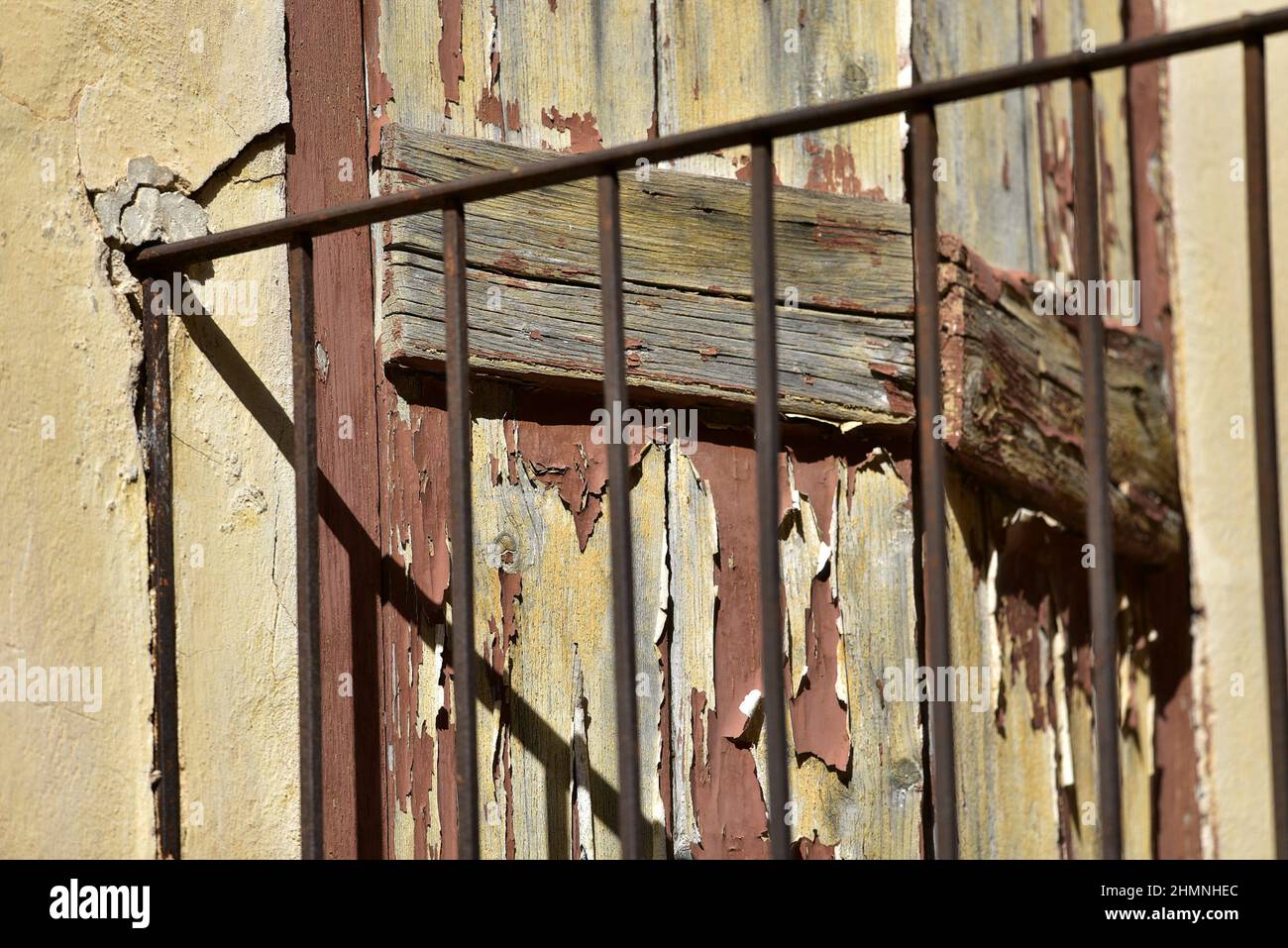 Old traditional rural house rusty forged iron balcony railing with a ...