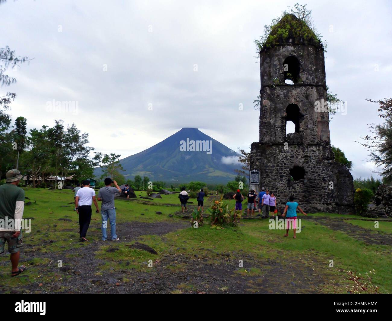 Old bell tower in Cagsawa in front of the volcano Mayon on the ...