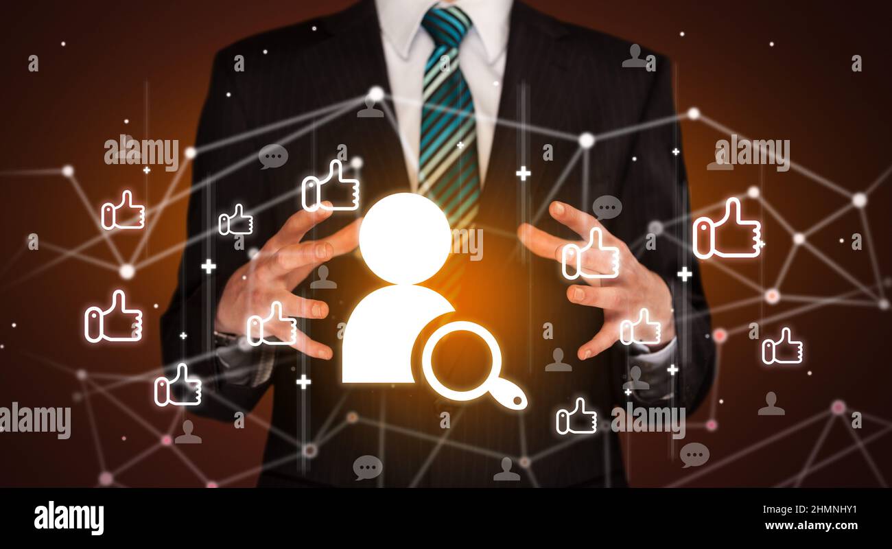 Hand holding social media icons Stock Photo - Alamy