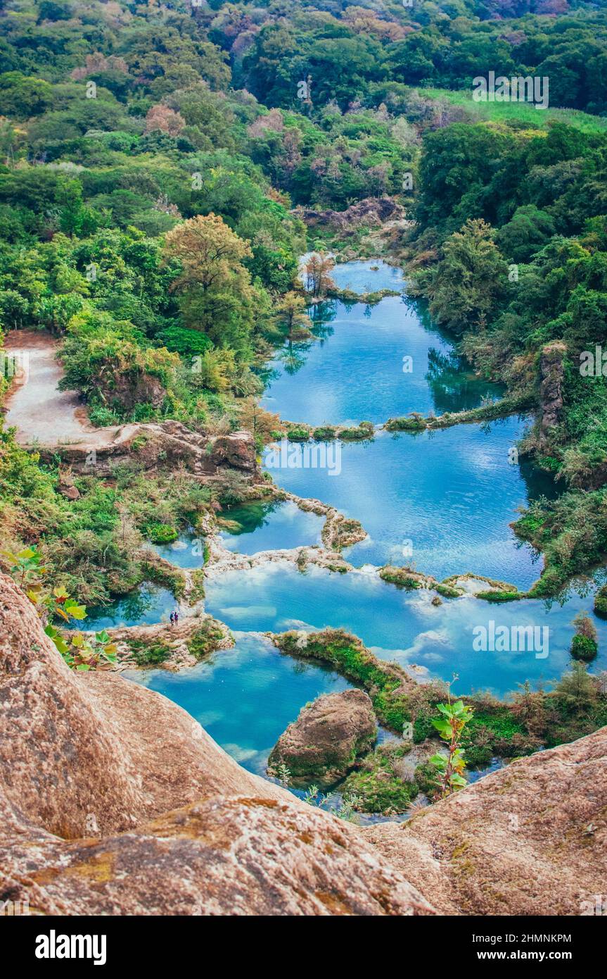 Natural water pools of the waterfall Salto del Agua - El Naranjo - San ...