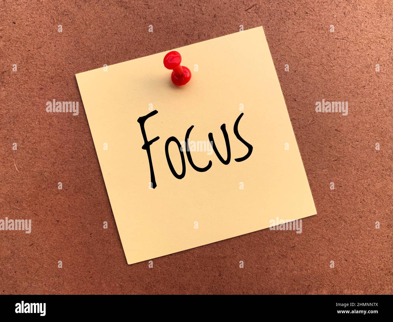 Focus text on yellow torn notepad. Conceptual Stock Photo - Alamy