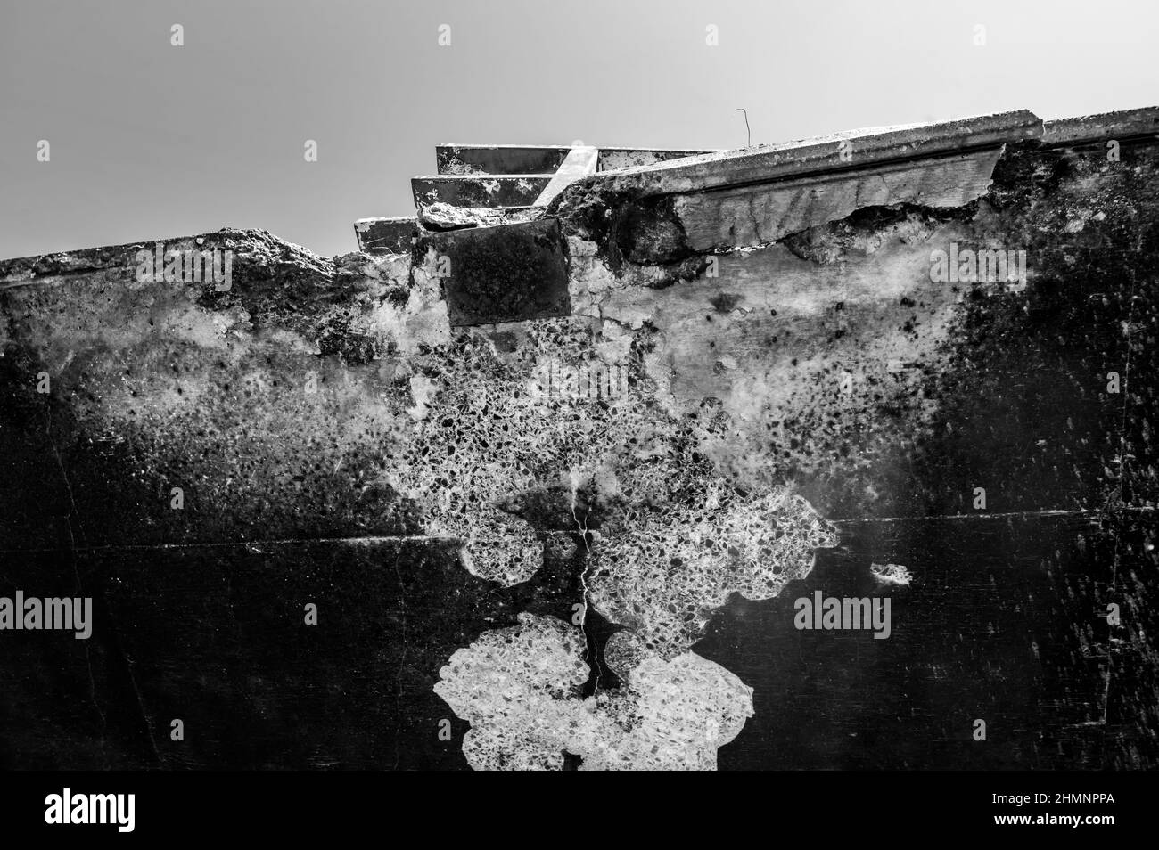 Crumbling concrete under a bridge support rail in need of repair Stock ...