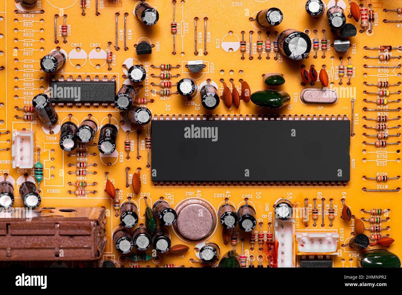 Macro Close up of components and microchips on old PC circuit board ...