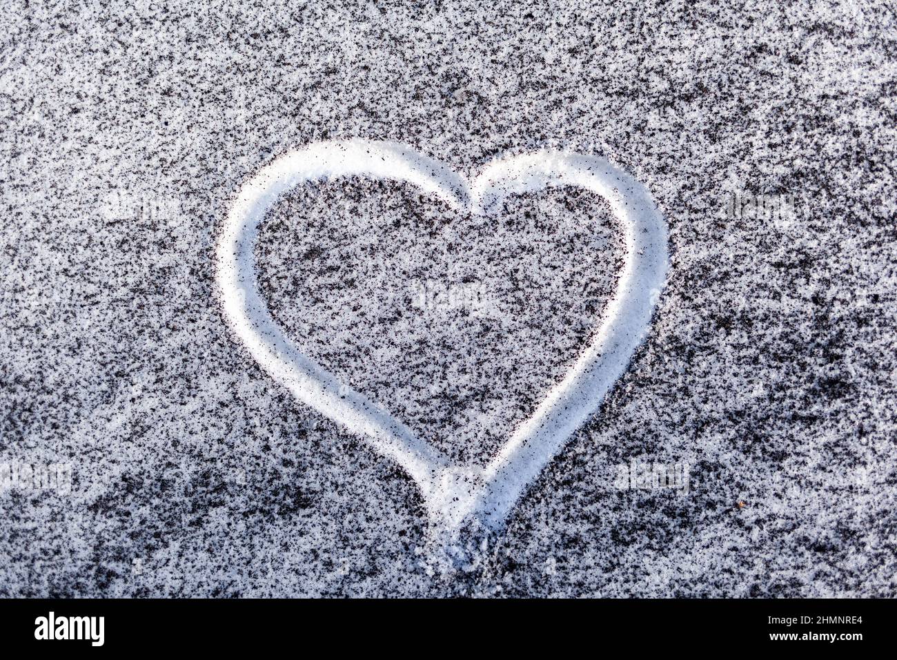 Black soot from the boiler room on white snow. Natural background. Snow ...
