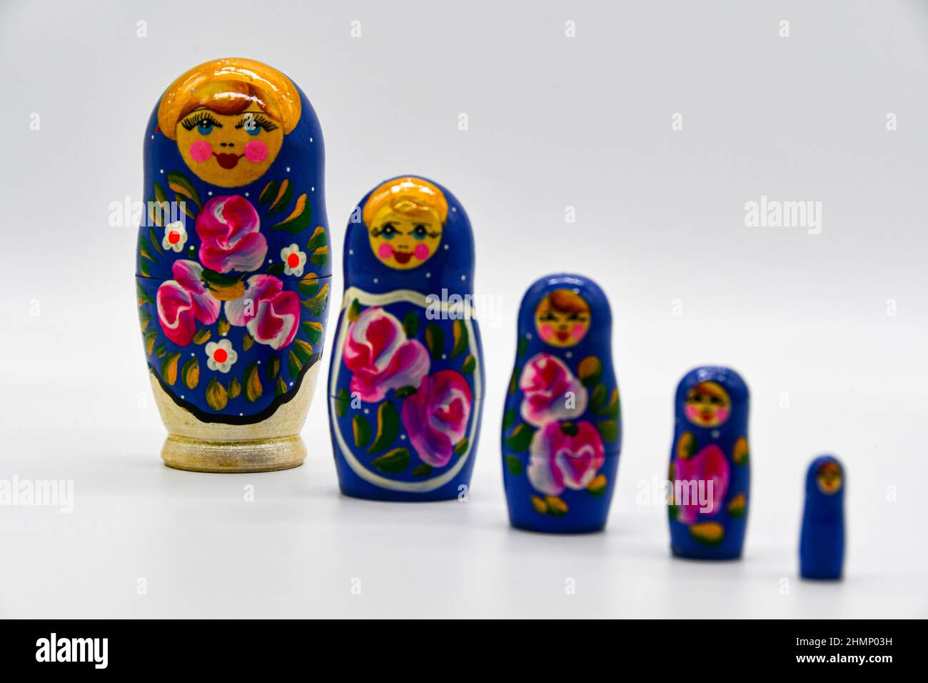Classic Russian matryoshkas in row on put with white background Stock ...