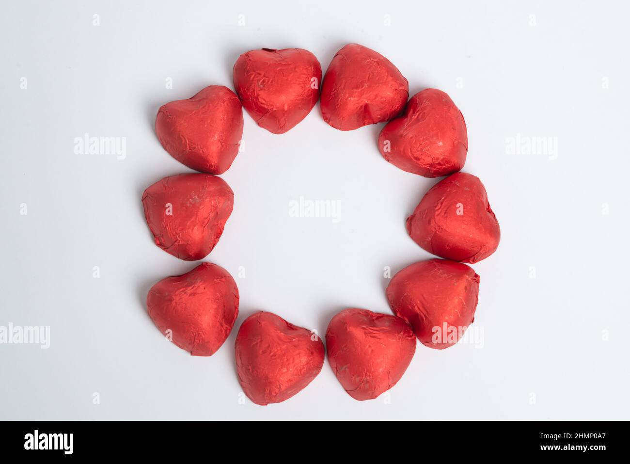 Chocolate red heart sweets for Valentine's Day on a white background in ...