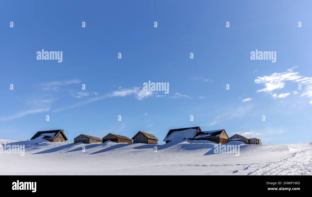 Isolated summer chalet and farm stables high up on the Swiss Alps ...