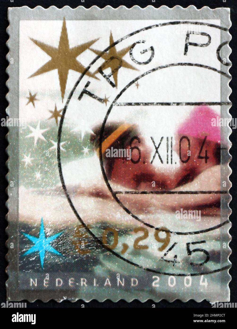 NETHERLANDS - CIRCA 2004: a stamp printed in the Netherlands shows man ...