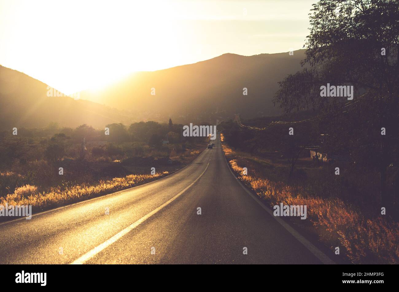 Driving into sunset hi-res stock photography and images - Alamy