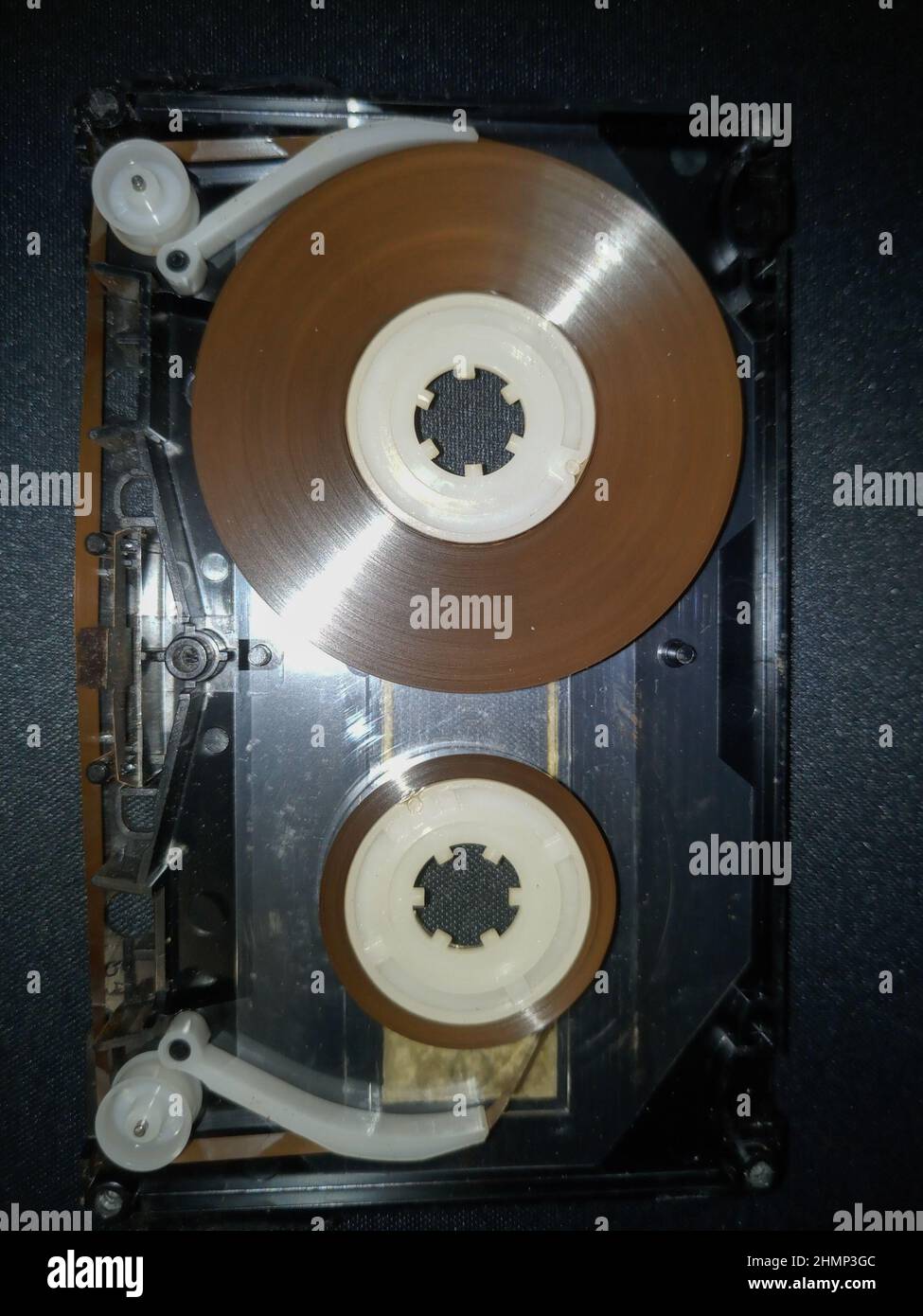 Disassembled audio cassette. Cassette film in an open case. Vintage ...