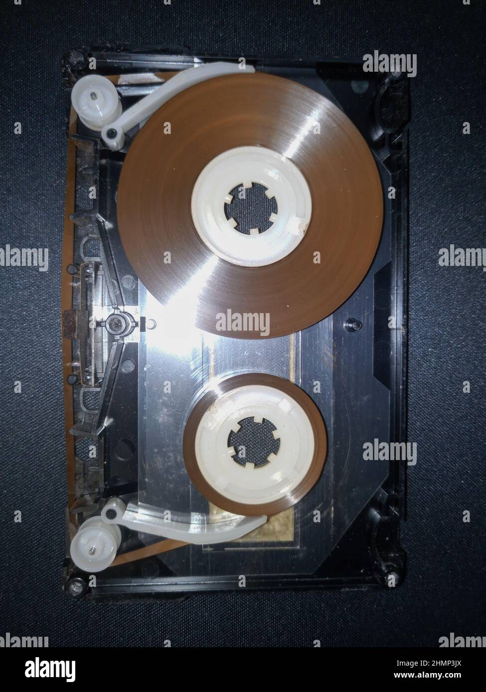 Disassembled audio cassette. Cassette film in an open case. Vintage ...