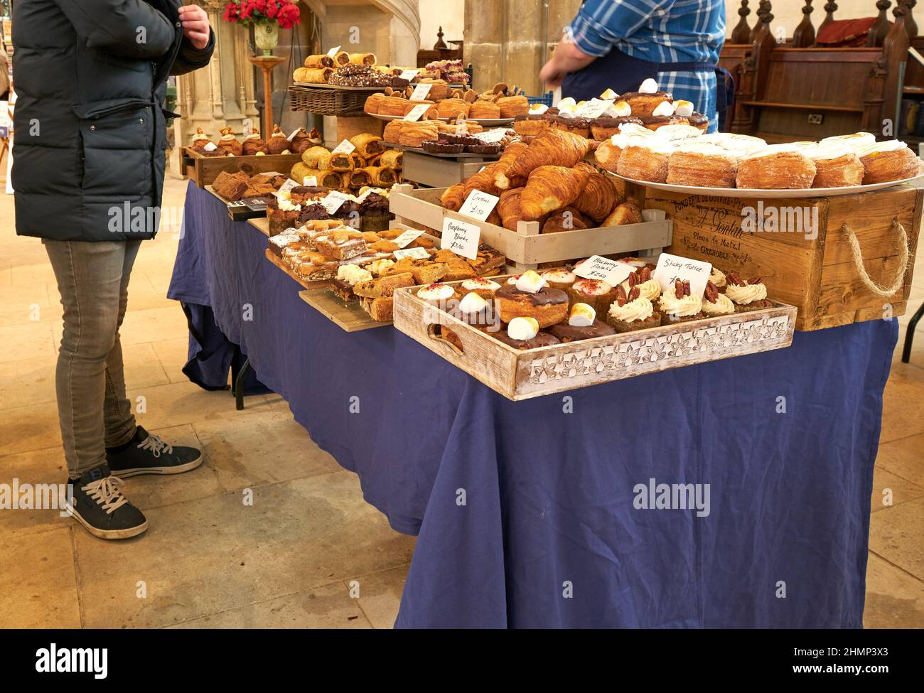 Cake stall at an indoor fair Stock Photo - Alamy