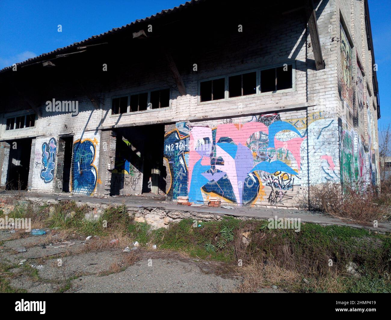 Old abandoned buildings with graffiti on the walls. Urban ghetto Stock ...