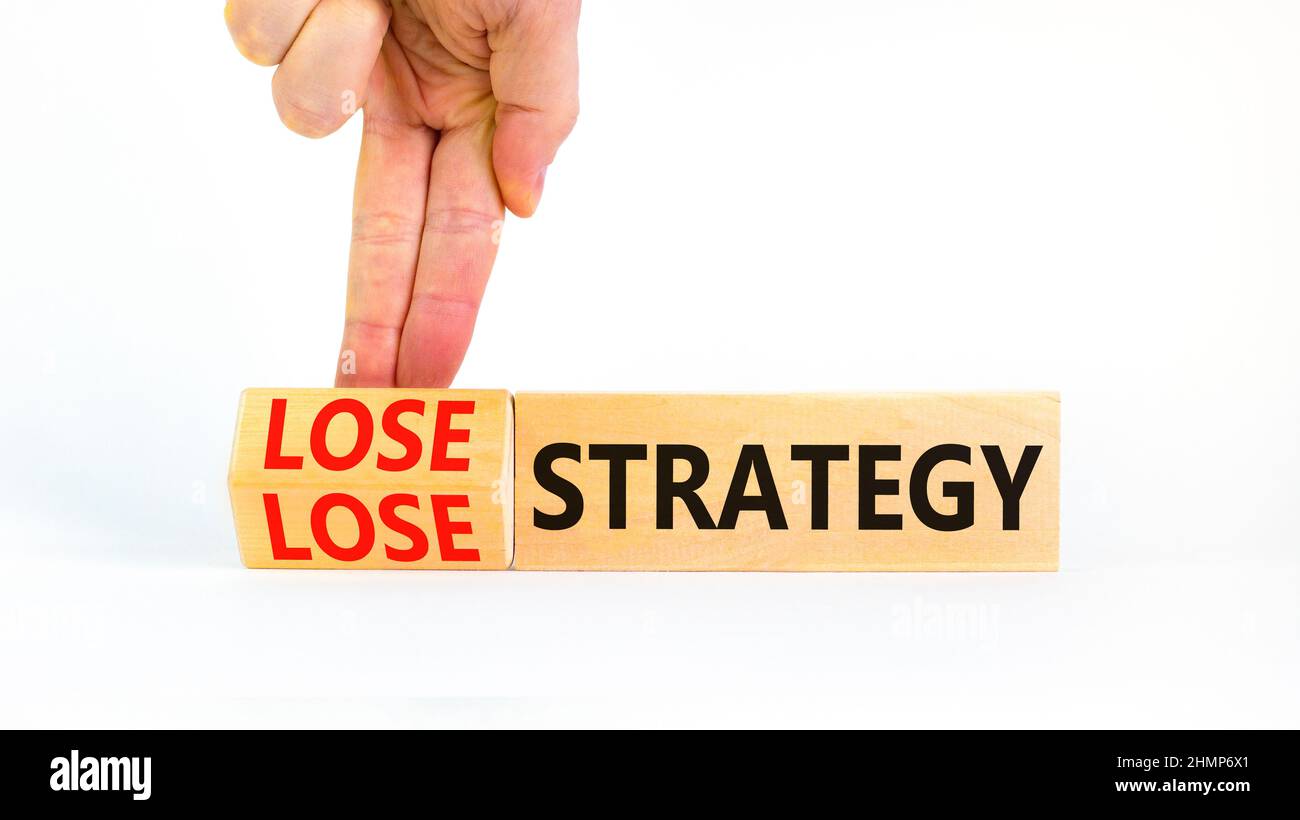 Lose-lose strategy symbol. Businessman turns wooden cubes with words ...