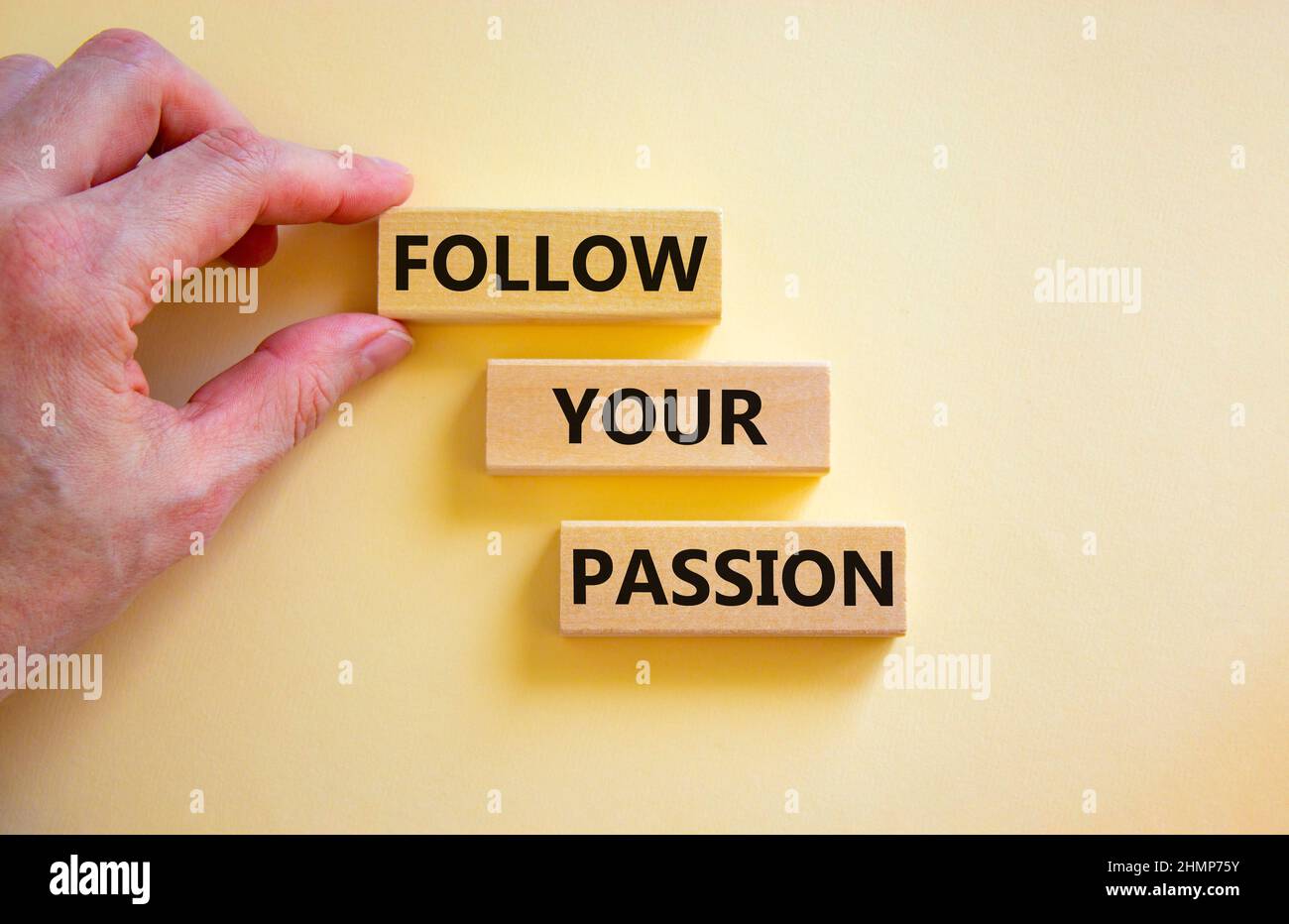 Follow your passion symbol. Concept words Follow your passion on blocks ...