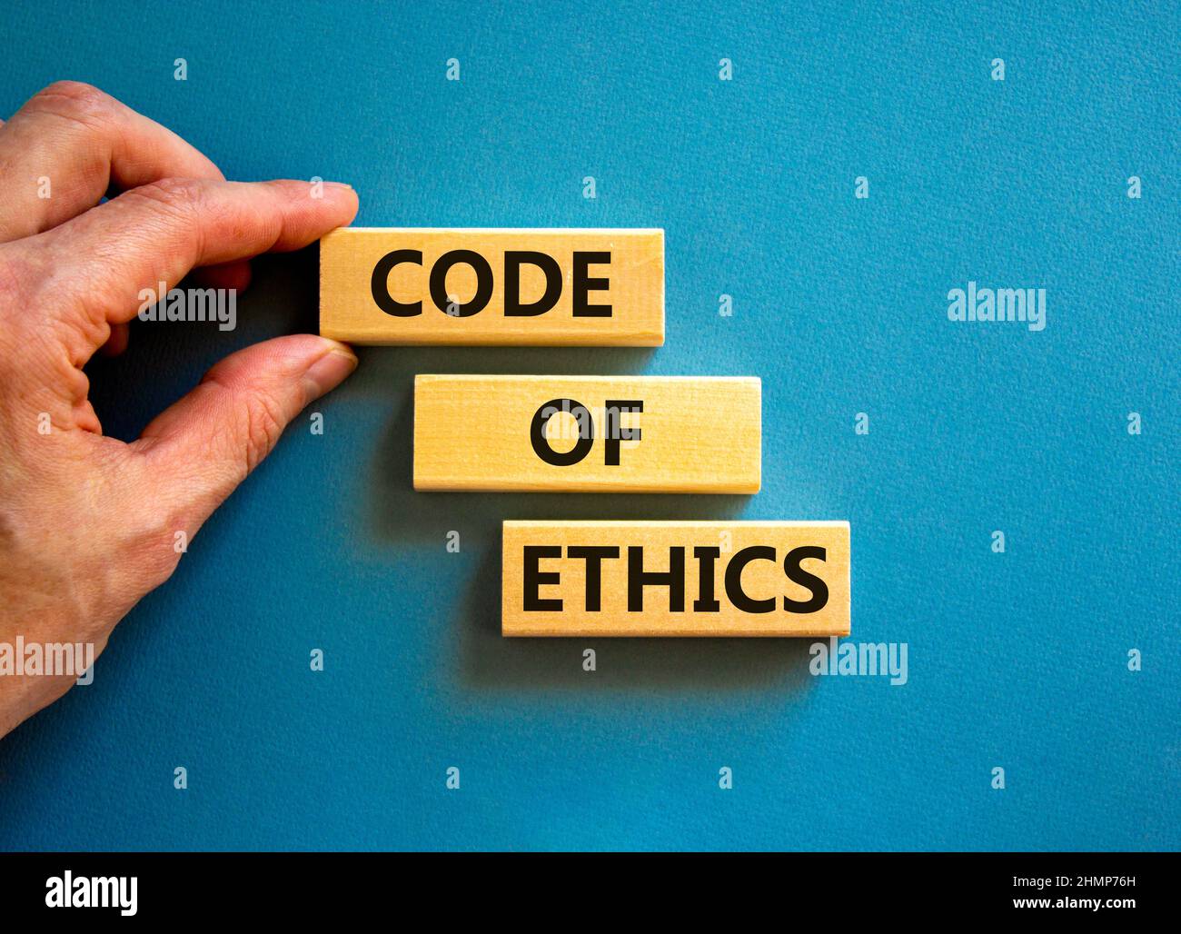 Code of ethics symbol. Concept words Code of ethics on wooden blocks on ...