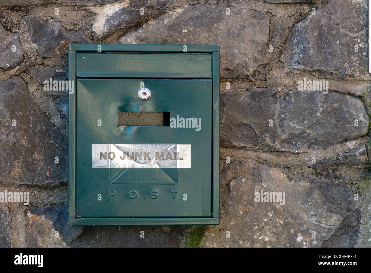 Mailboxes mounted at entry gates, mailboxes embedded in a stone wall ...