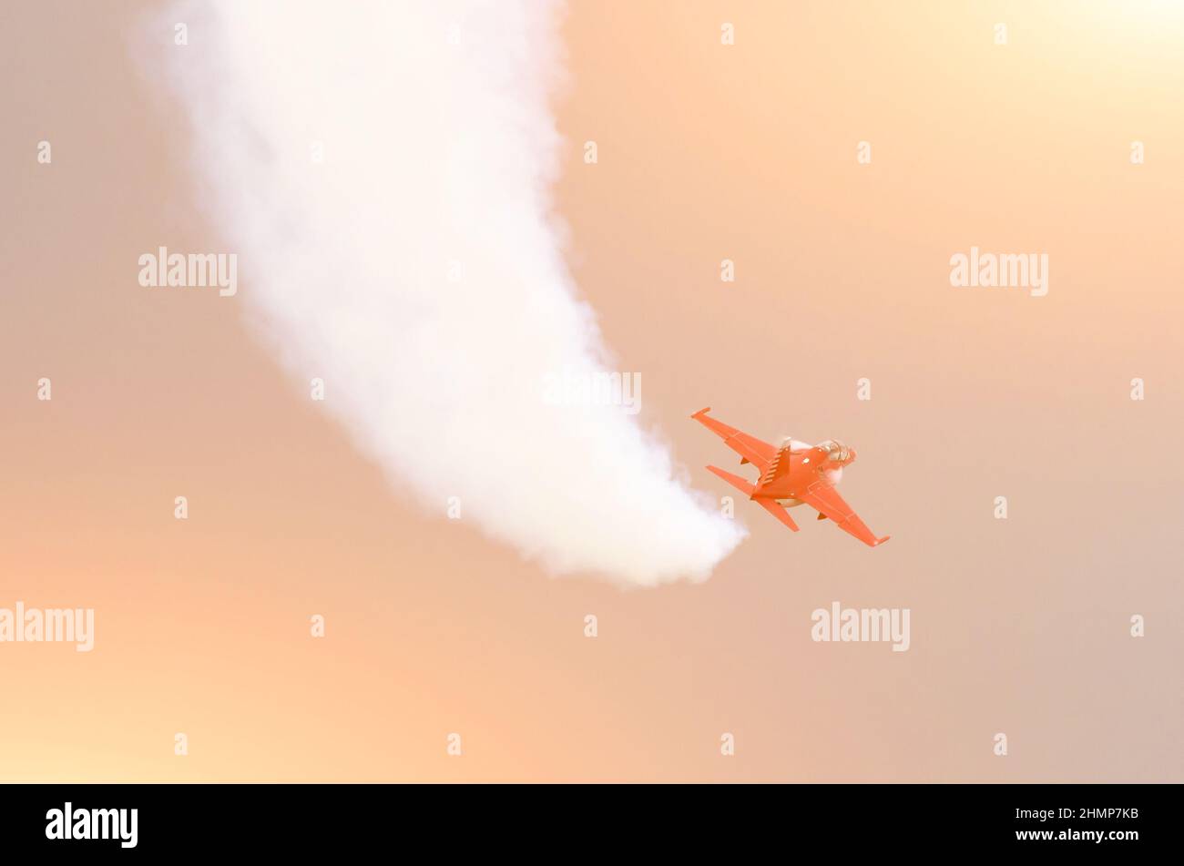 Group of white fighter jet airplane with a trace of white smoke against ...