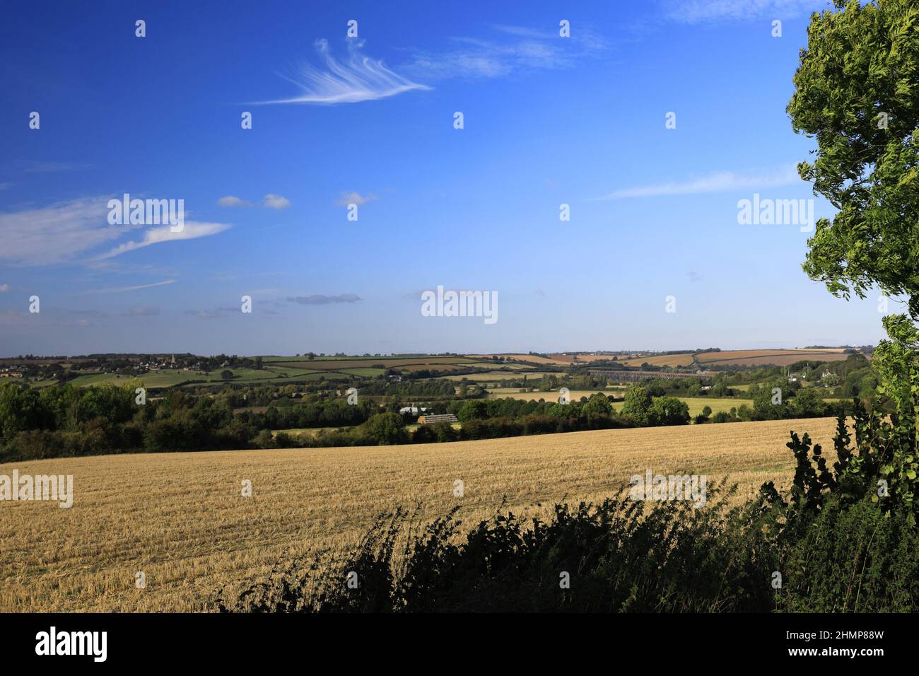 Summer view over the river Welland valley, Harringworth village ...