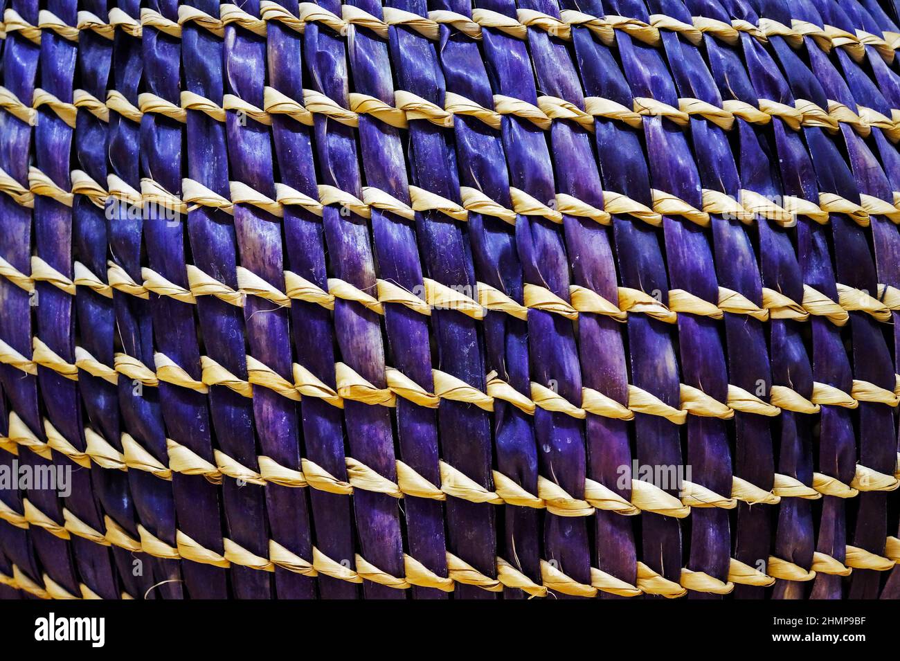Purple and beige straw patterned surface Stock Photo - Alamy