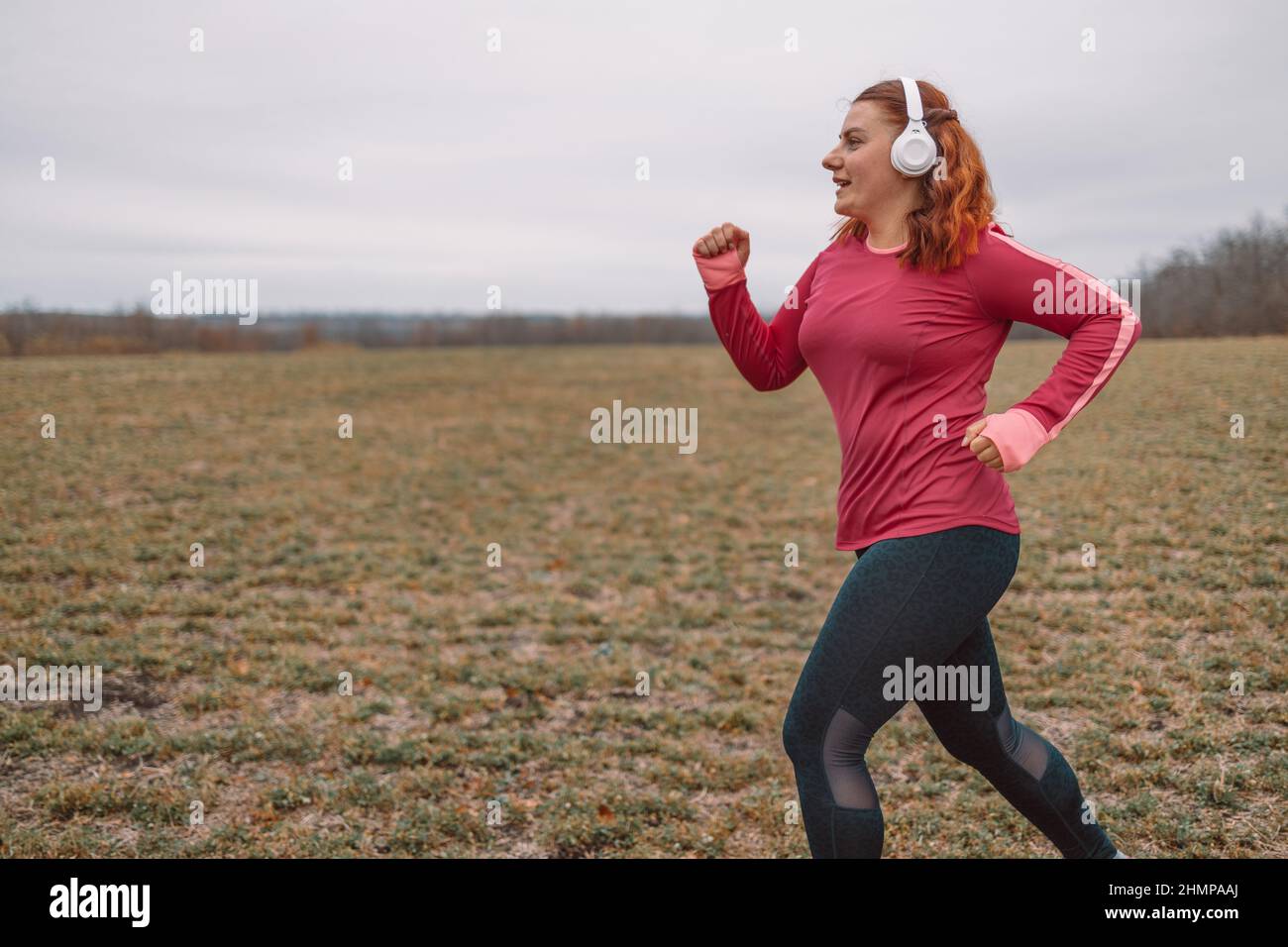 Running woman. Female runner jogging at the park. Fitness healthy ...