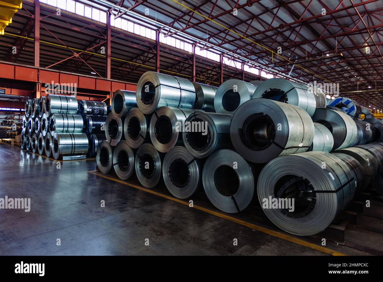 Rolls of galvanized steel sheet inside the factory or warehouse Stock ...