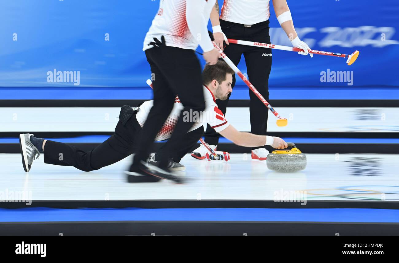 Beijing, China. 11th Feb, 2022. Henrik Holtermann (C) of Denmark ...