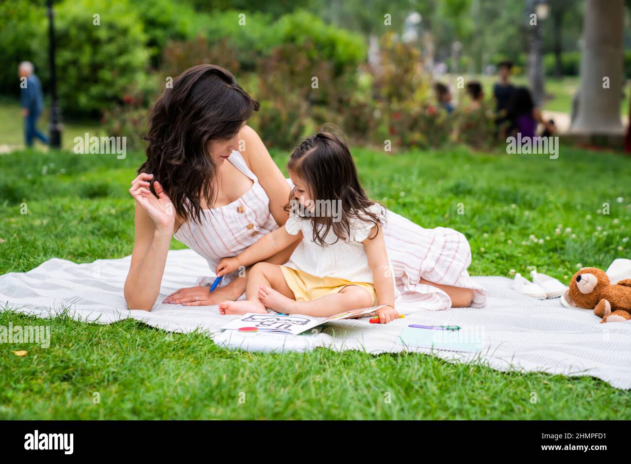 Mother having pastime with little girl kid outdoors Stock Photo - Alamy