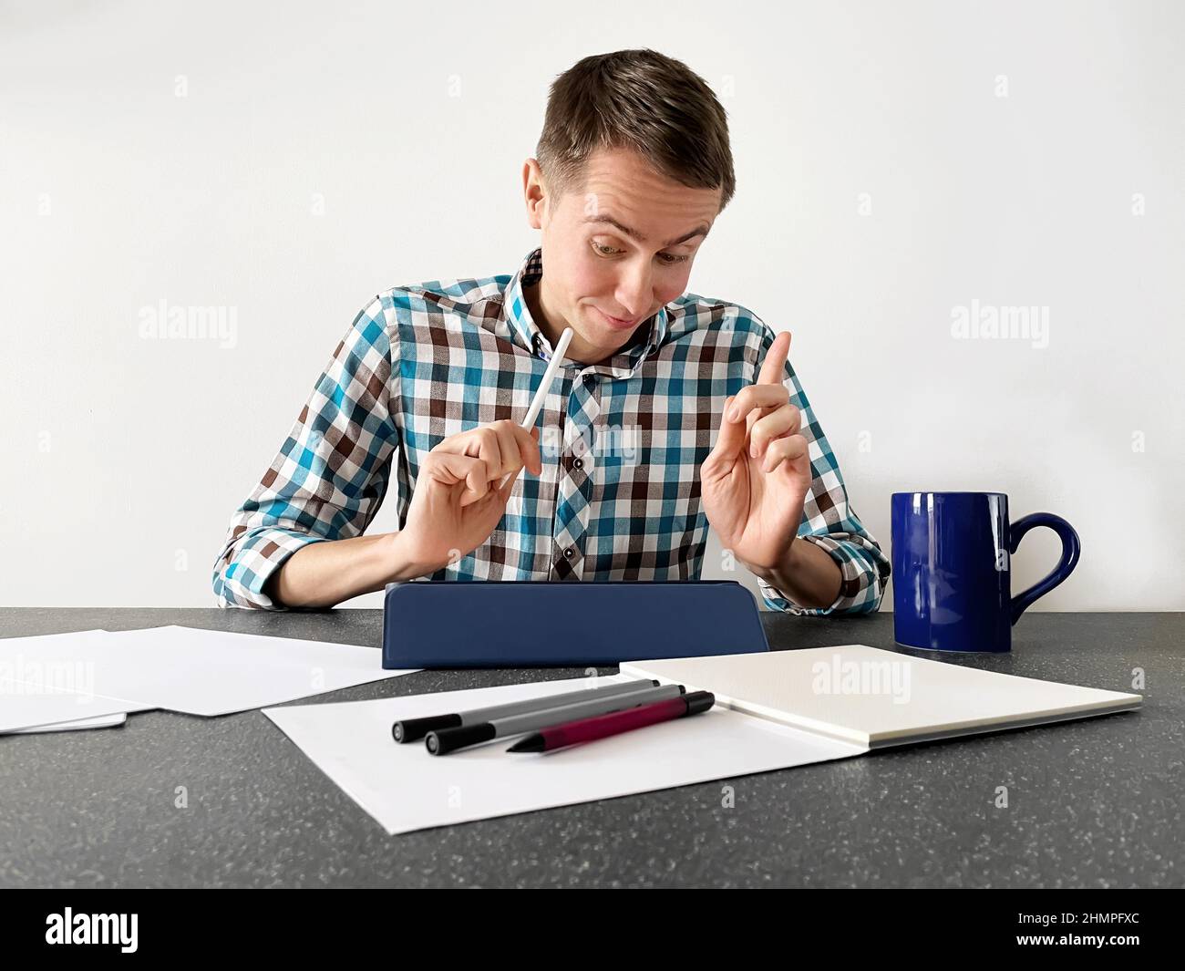 Found handsome young man hi-res stock photography and images - Alamy