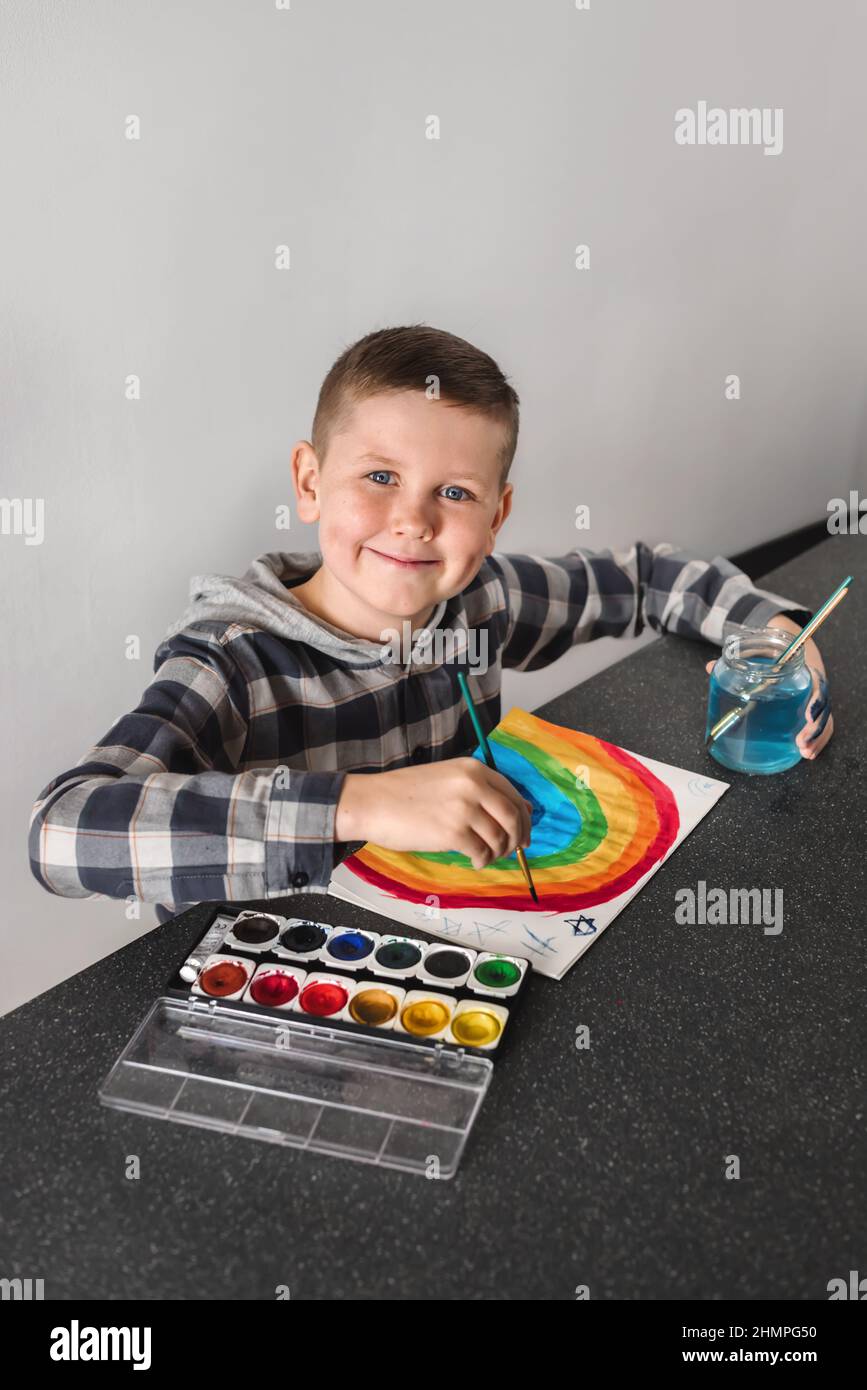 Boy Having Fun Enjoy Painting Rainbow Stock Photo - Alamy