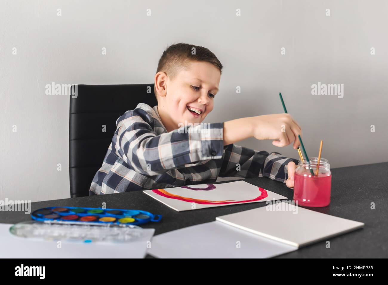 Boy Having Fun Enjoy Painting in Album Stock Photo - Alamy
