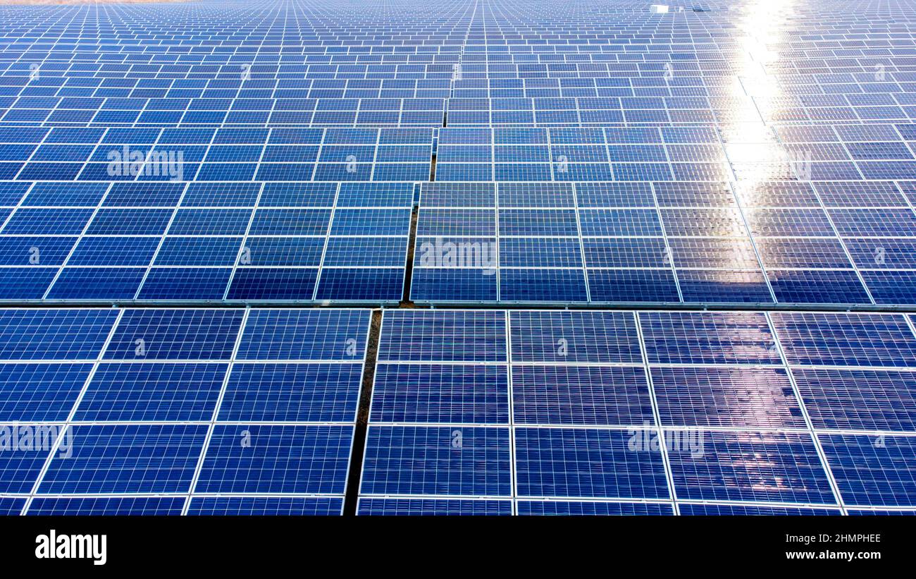 Drone flight over solar panels hi-res stock photography and images - Alamy
