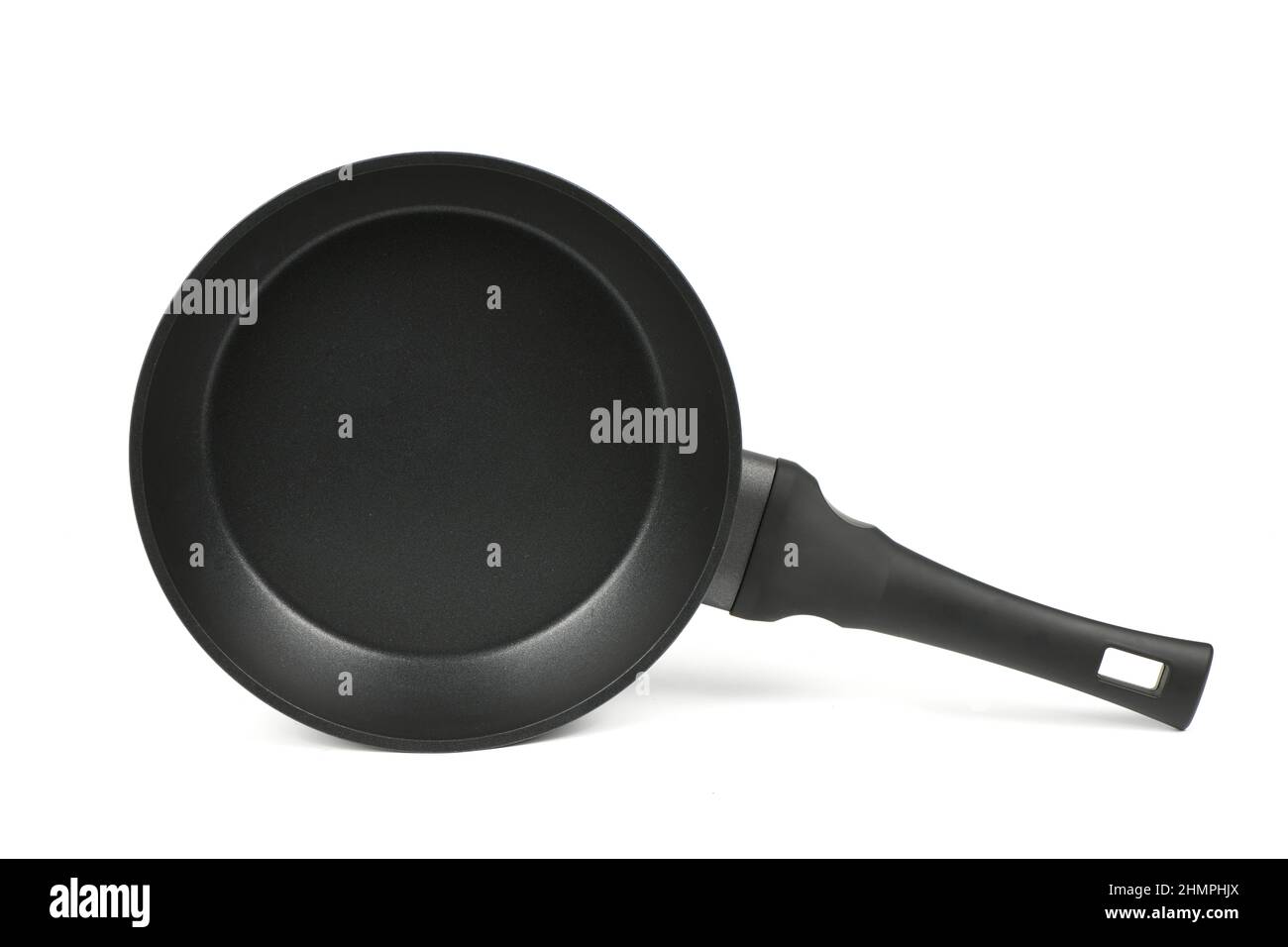 Black frying pan on white background. High resolution photo. Full depth ...