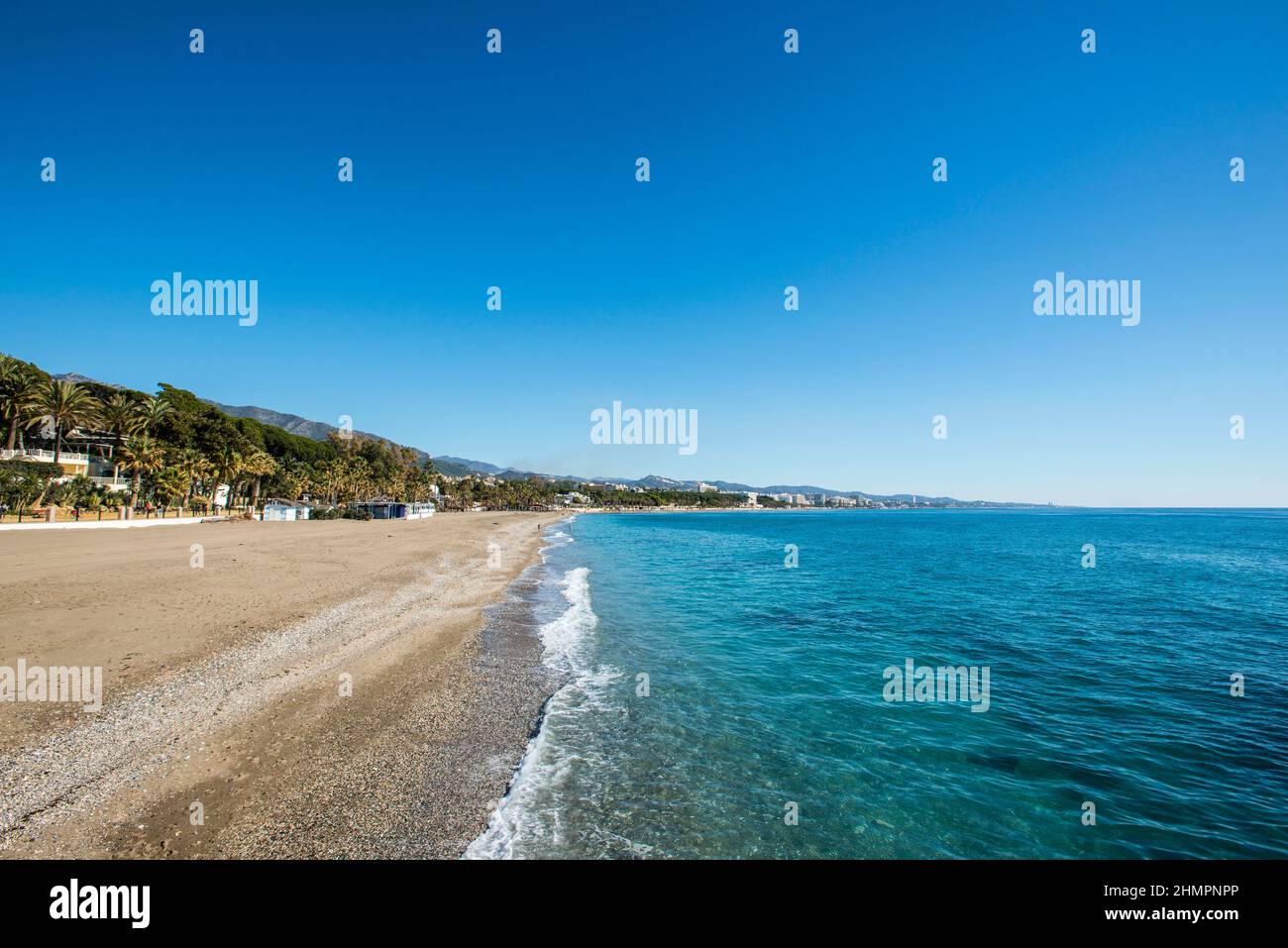 Walk along the beautiful beaches of Marbella Stock Photo - Alamy
