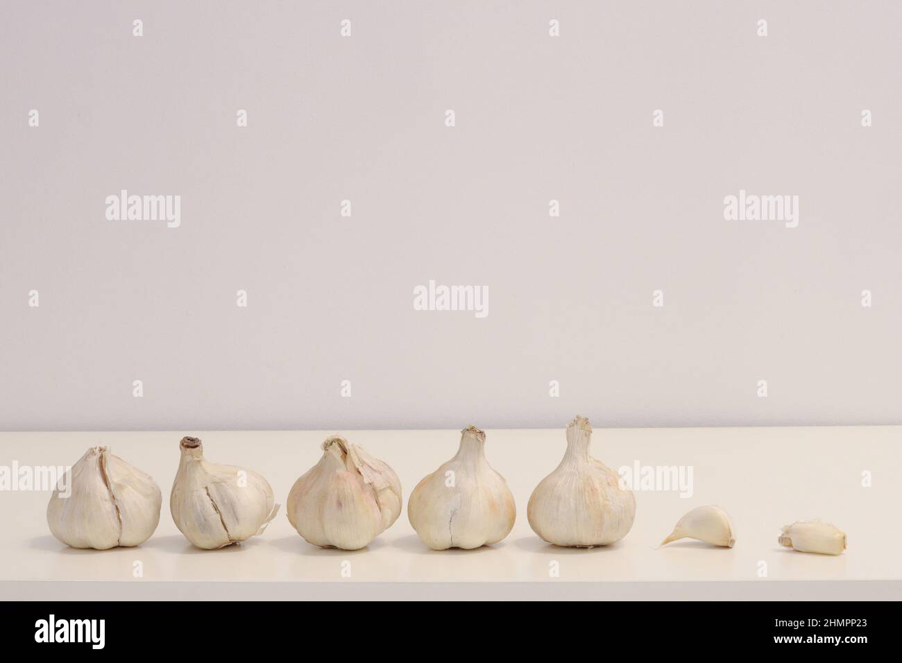 Garlic Bulbs and Pods on White Background Stock Photo - Alamy