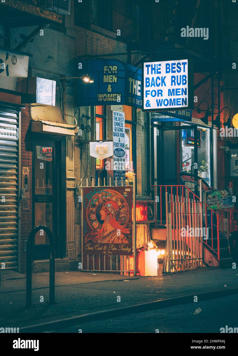 Back rub sign at night, in the West Village, Manhattan, New York City ...