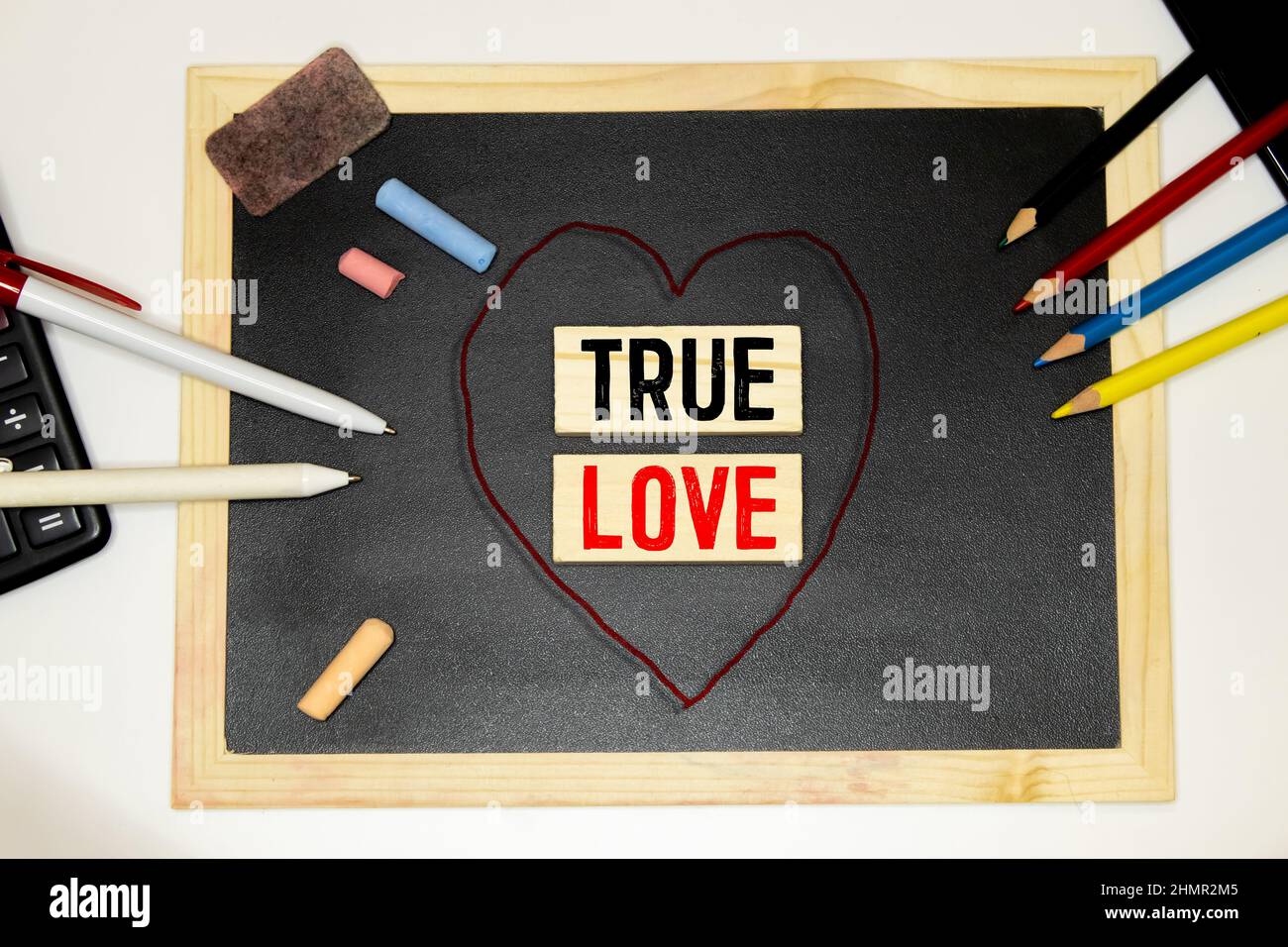 Key and heart as symbol of love with text true love Stock Photo - Alamy