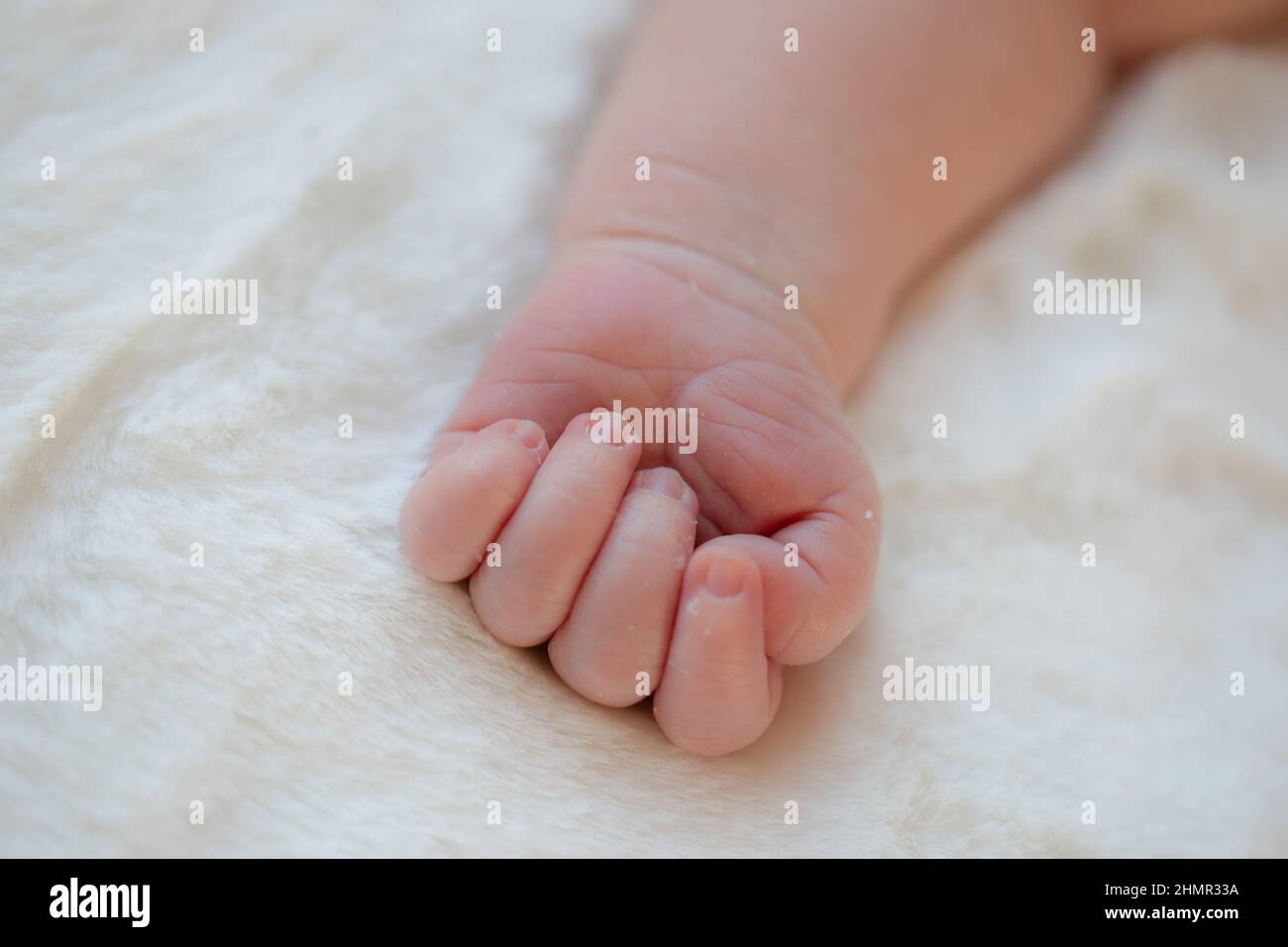 Babies hand hi-res stock photography and images - Alamy