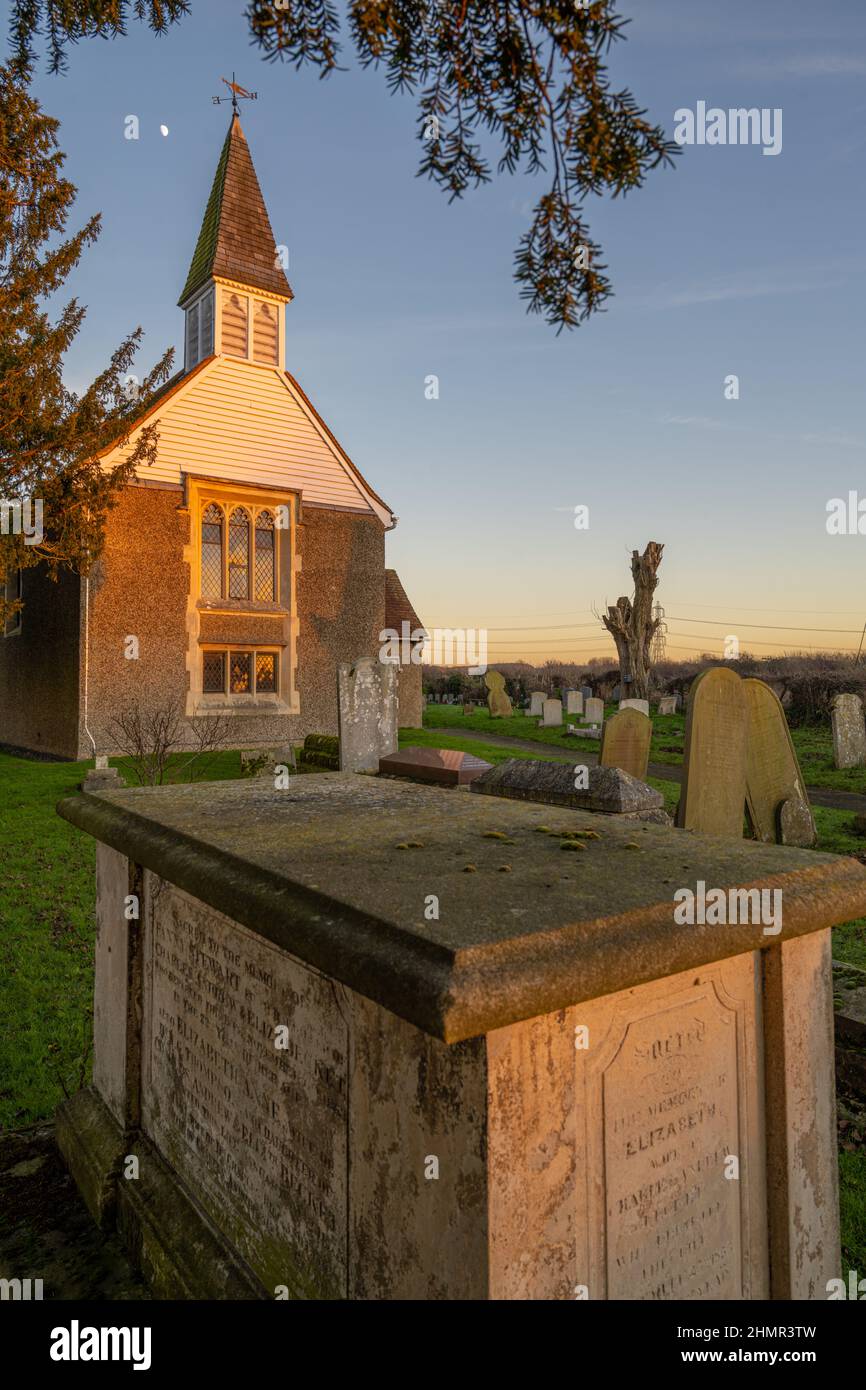 The moon above Saint Margaret's Church Ifield near Gravesend at sunset ...