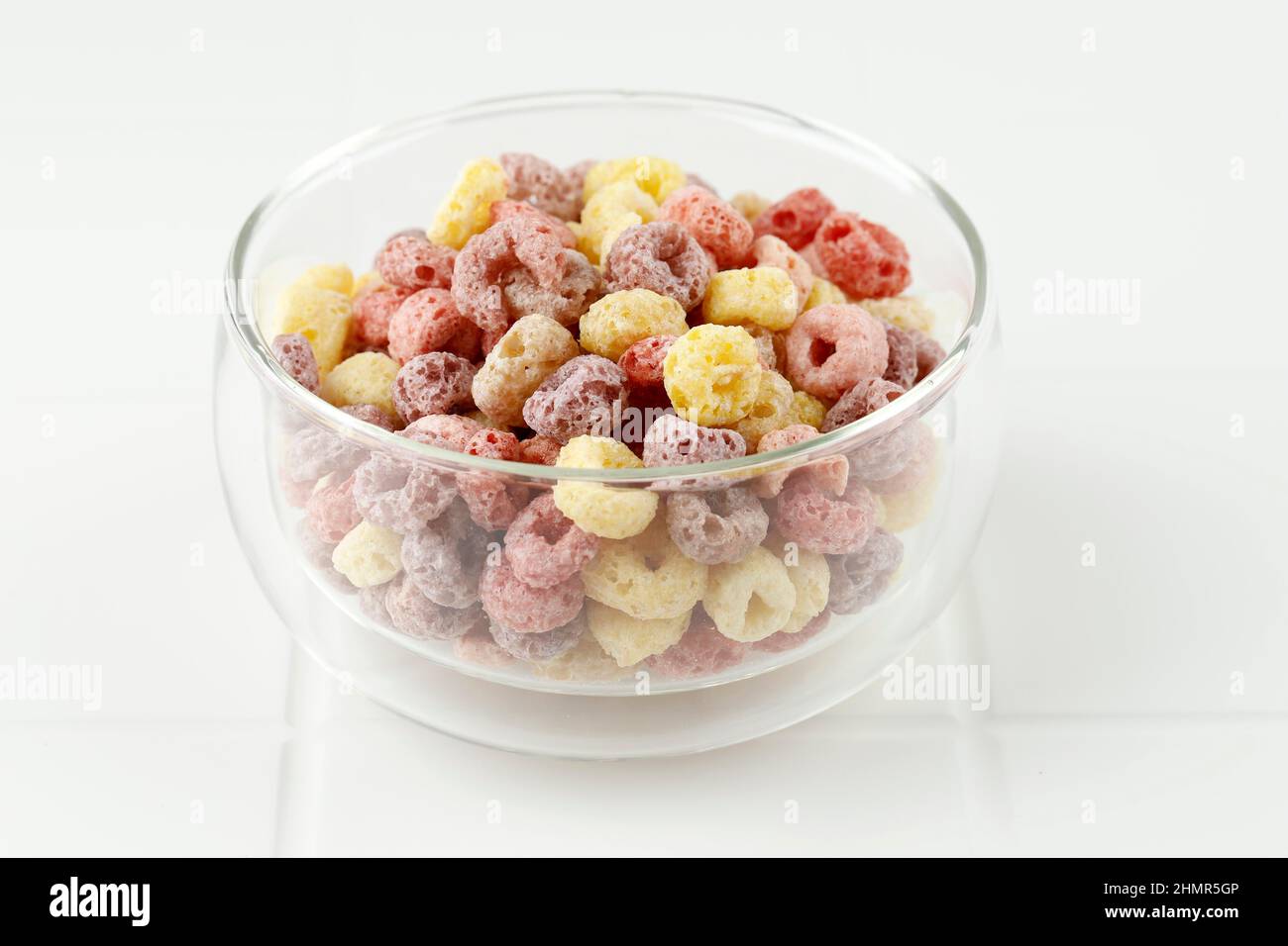 Fruit Loops Colorful Cereal Ring on Clear Bowl, Isolated on White Stock ...