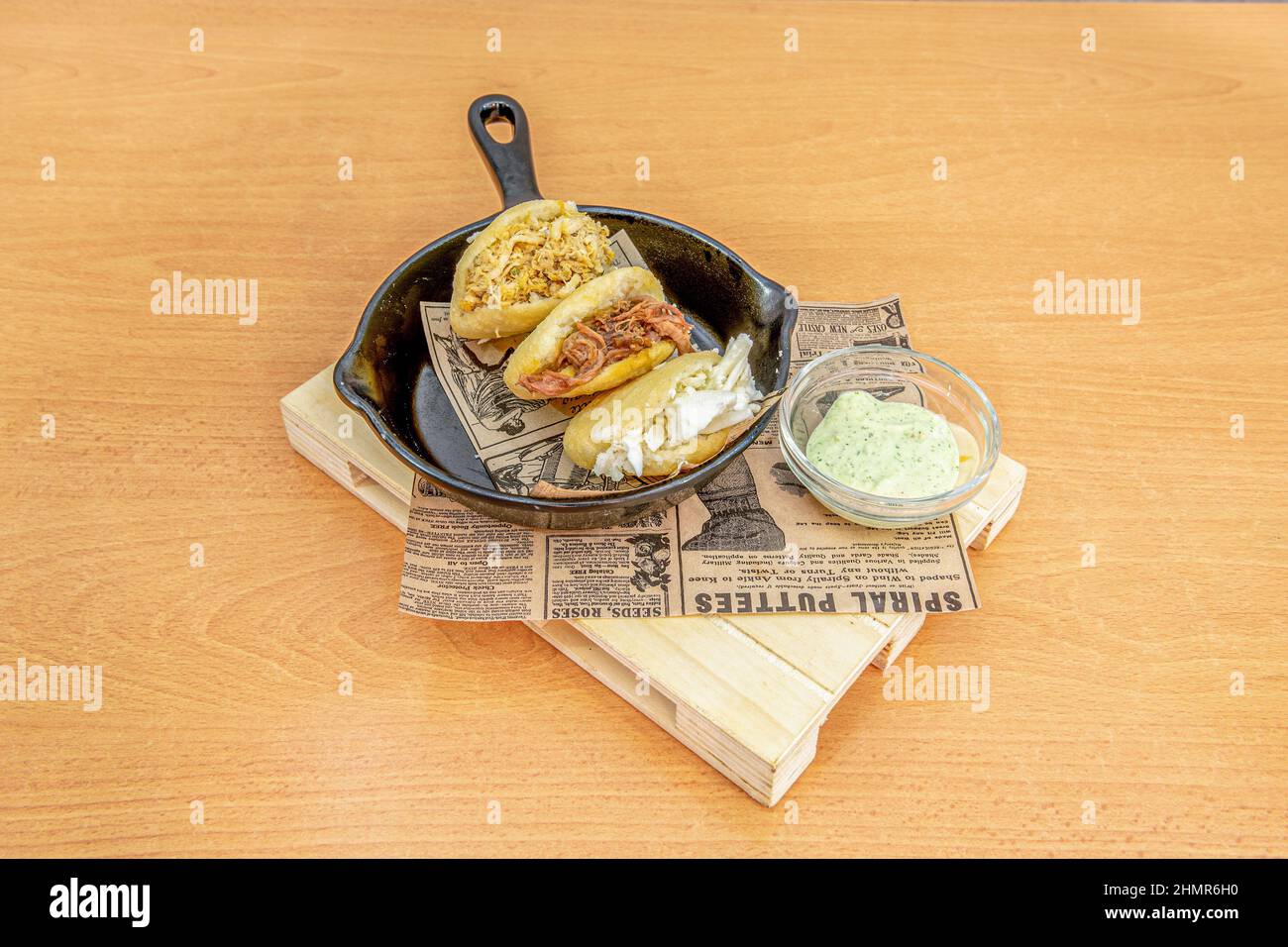 The arepa is a food of pre-Columbian origin, made from ground dry corn ...