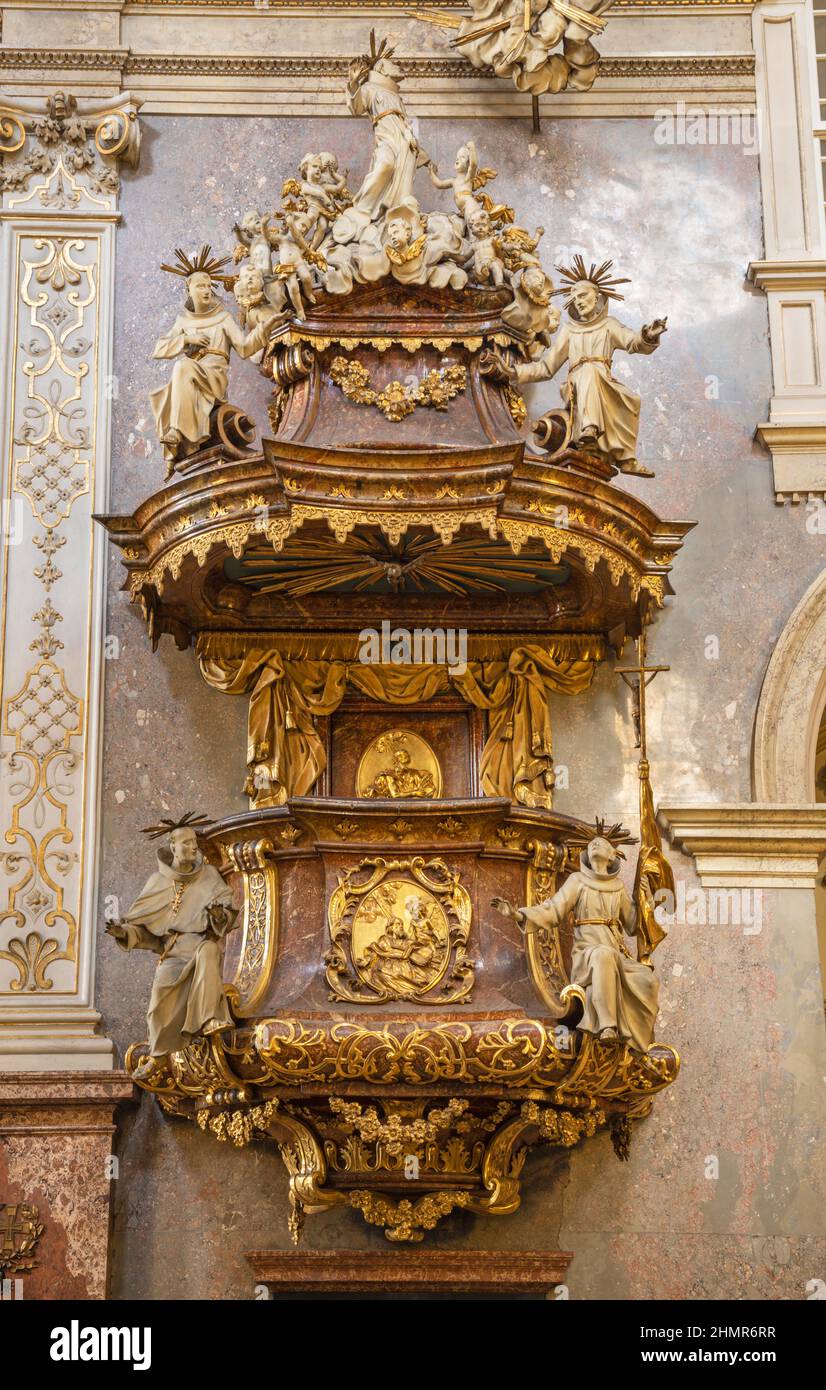 VIENNA, AUSTIRA - JULI 5, 2021: The carved broque pulpit in the church ...