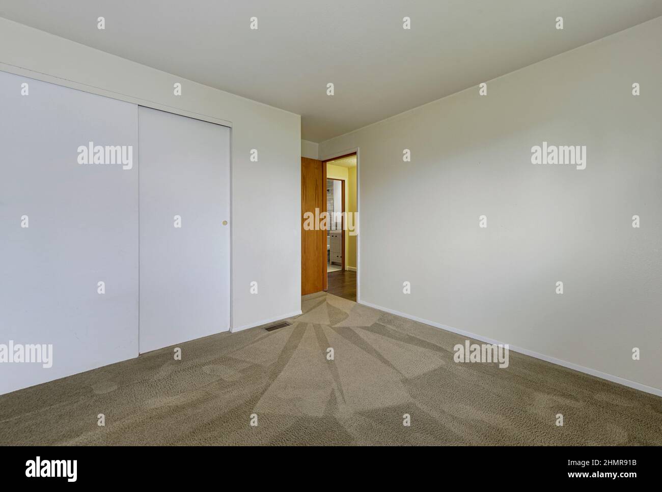 Modern residential empty bedroom interior Stock Photo - Alamy