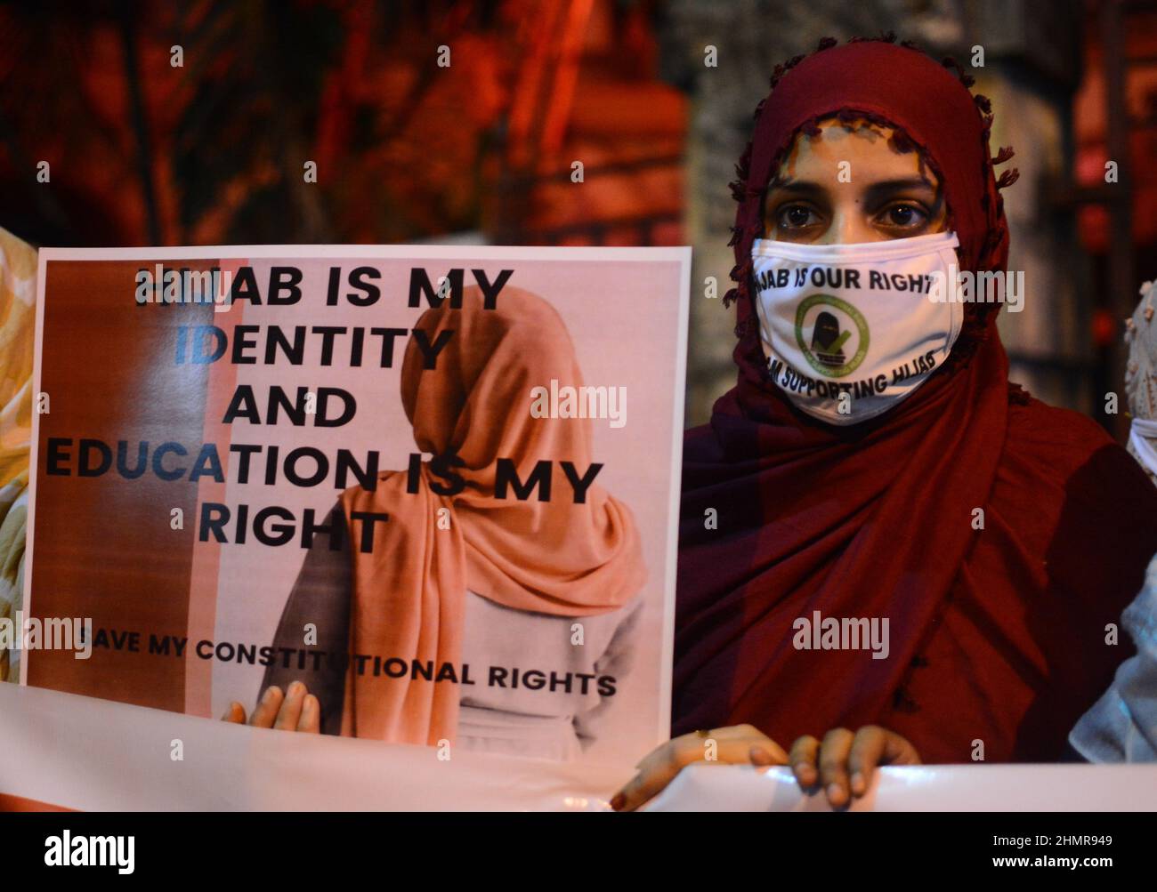 Kolkata, West Bengal, India. 11th Feb, 2022. A woman take to the street and held a candlelight ...