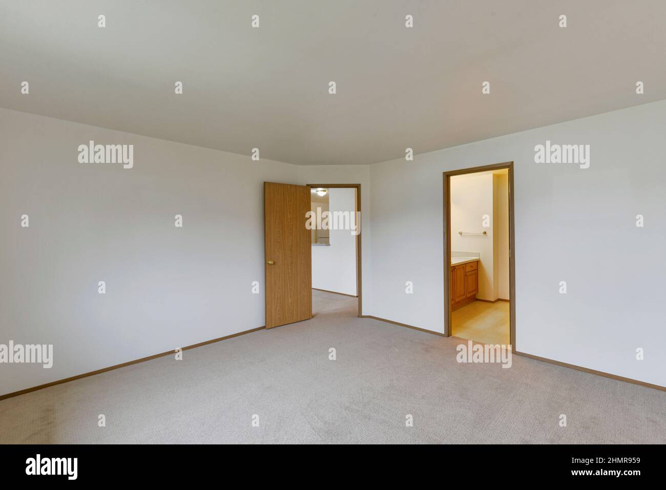 Modern residential empty bedroom interior Stock Photo - Alamy